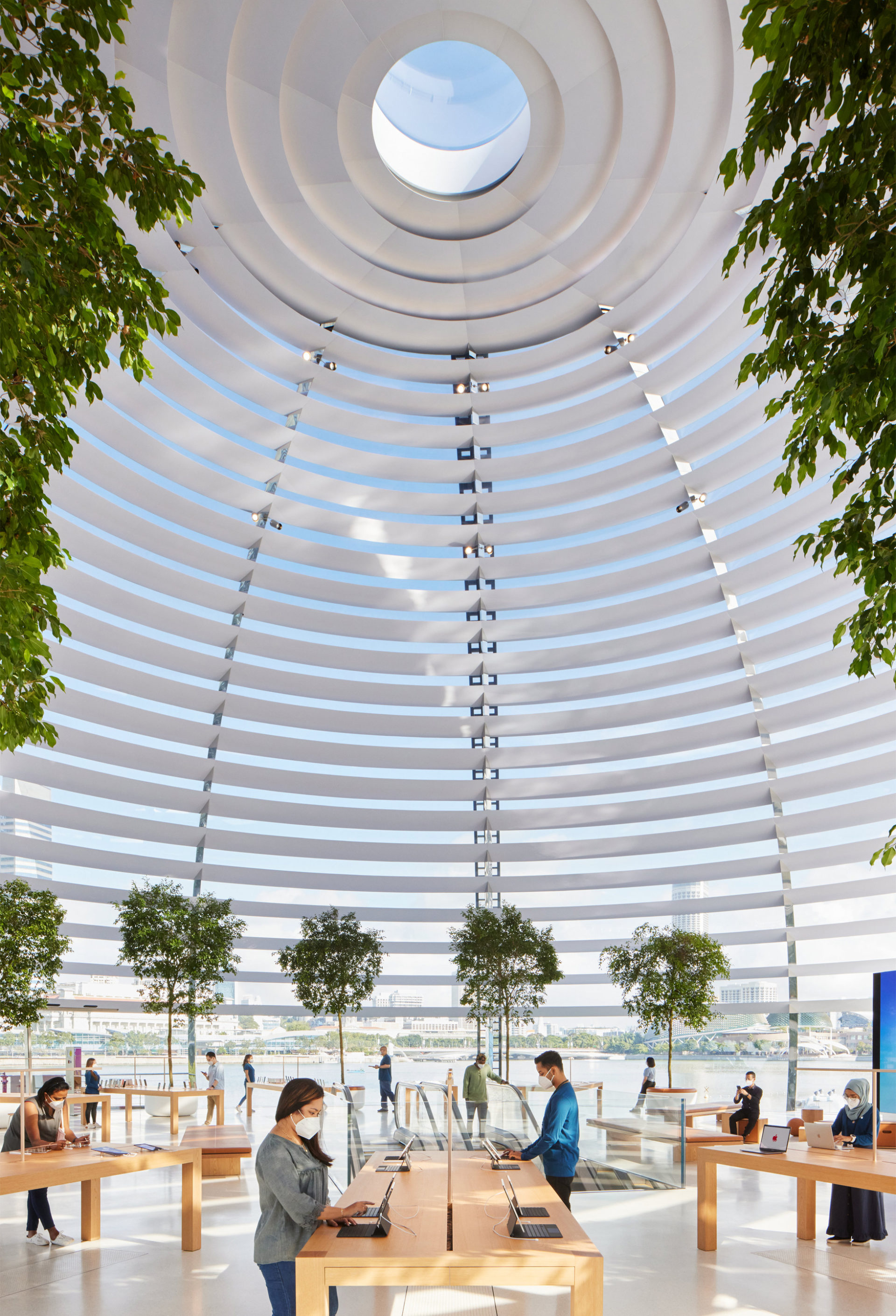 Apple opens first water-floating Marina Bay Sands store ...